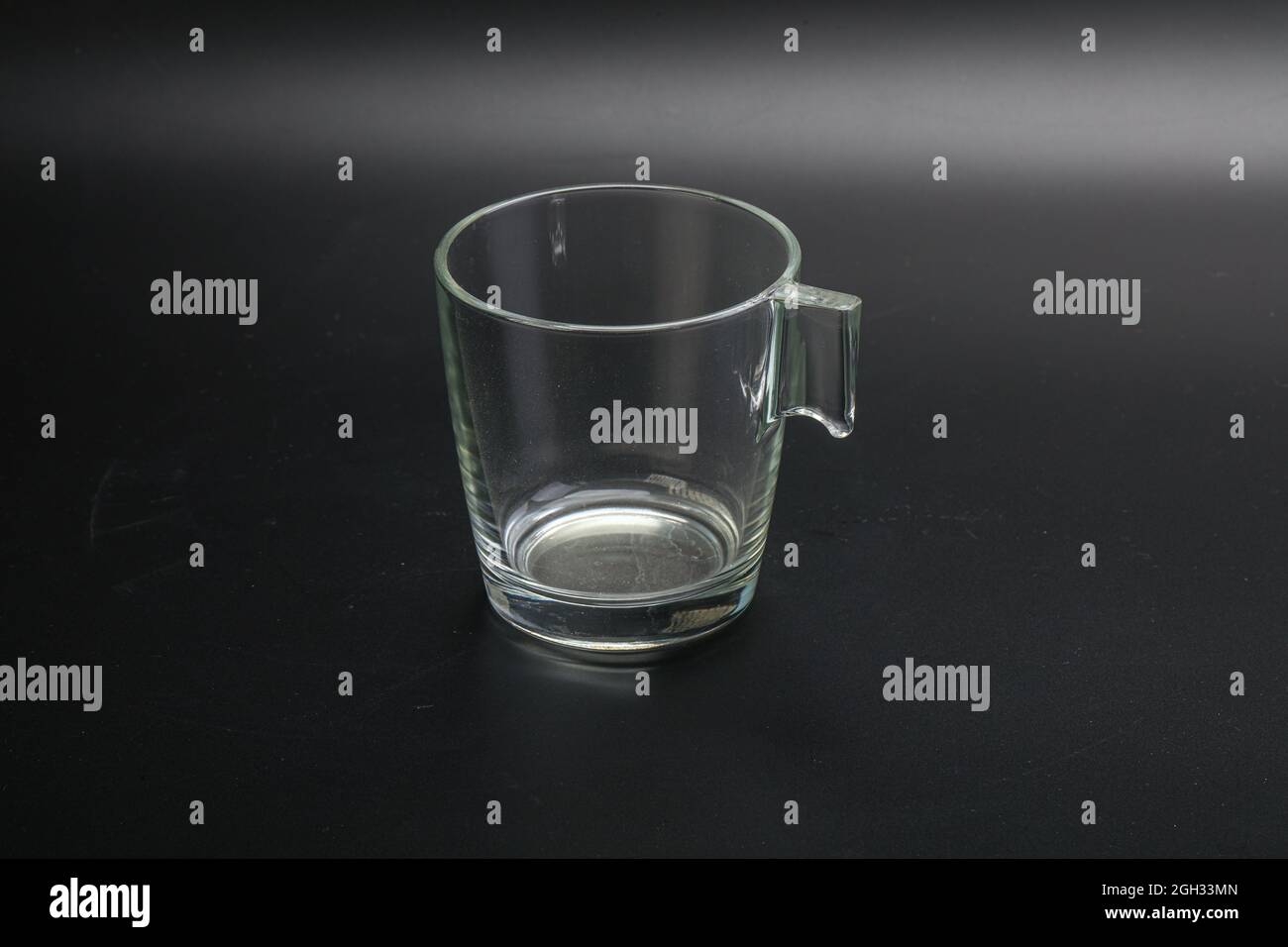 Empty glass cup for drinks isolated Stock Photo - Alamy