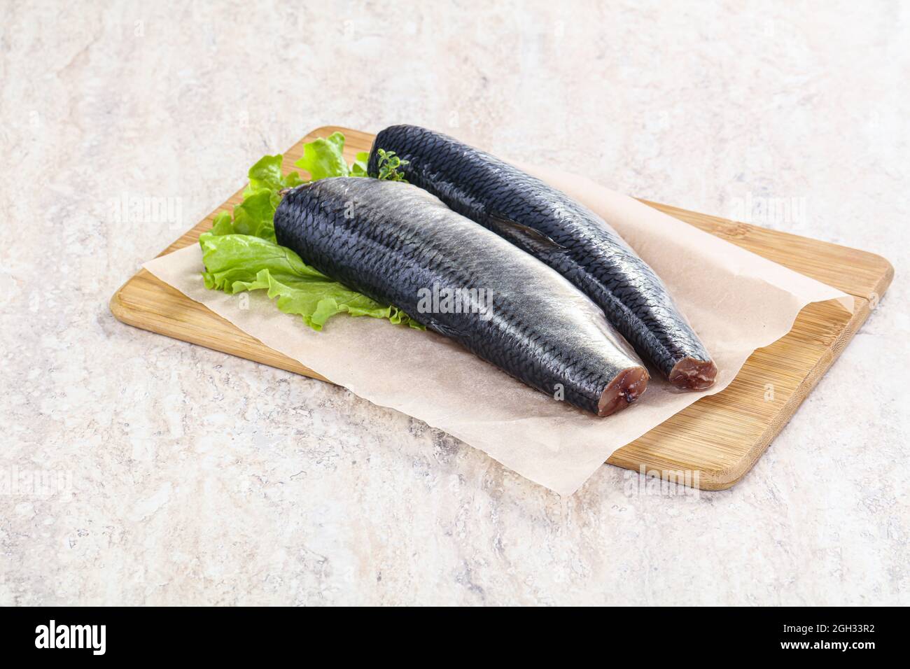 Marinated Herring fillet with skin for cooking Stock Photo - Alamy