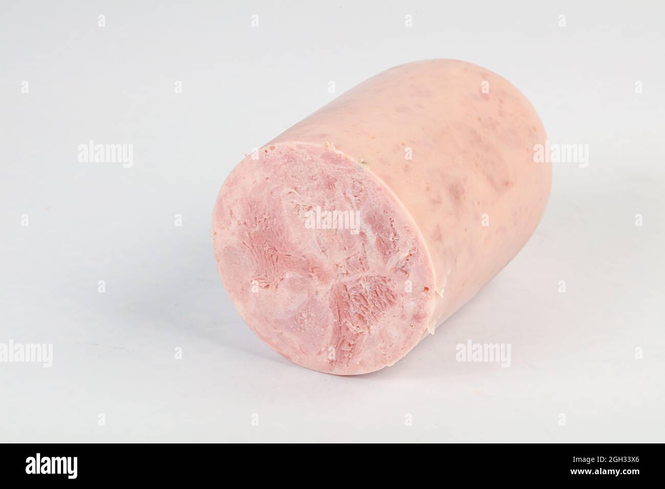 Delicous Pork ham sausage cut isolated Stock Photo - Alamy