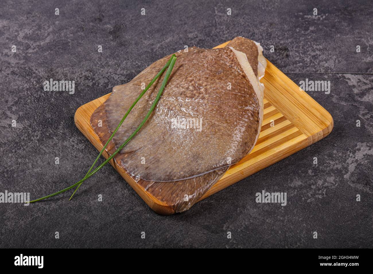 Raw stingray wings tasty fillet for cooking Stock Photo - Alamy