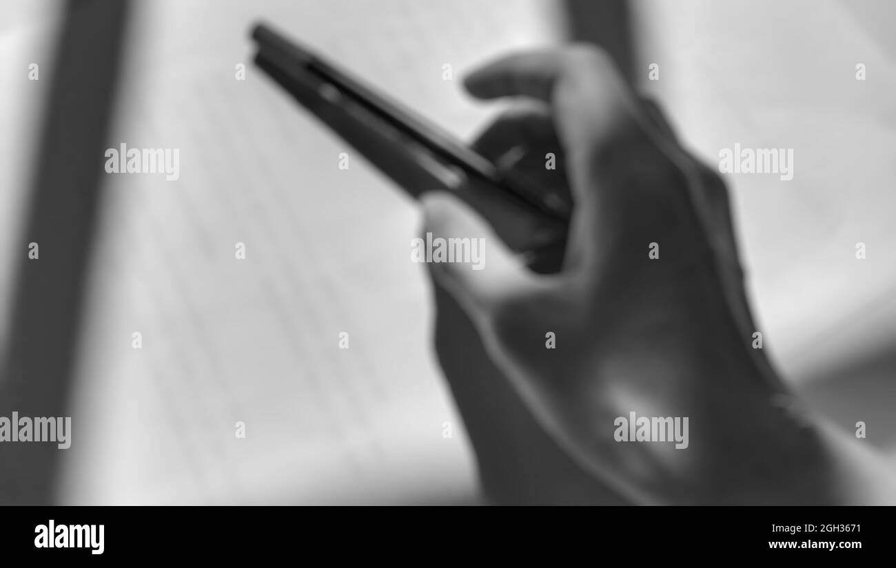 View of a marker in the hand in grayscale Stock Photo - Alamy