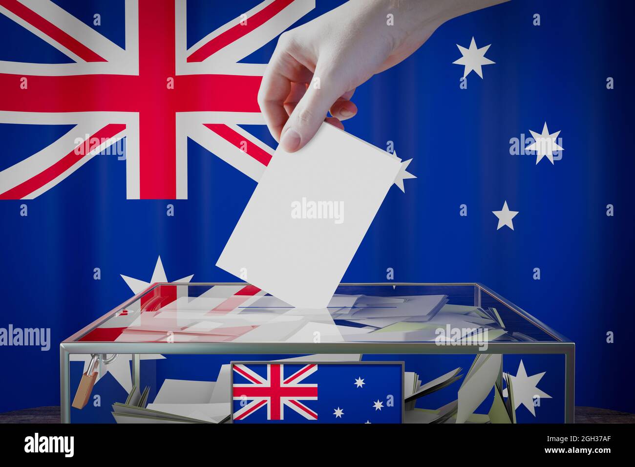 Australia flag, hand dropping ballot card into a box - voting, election ...