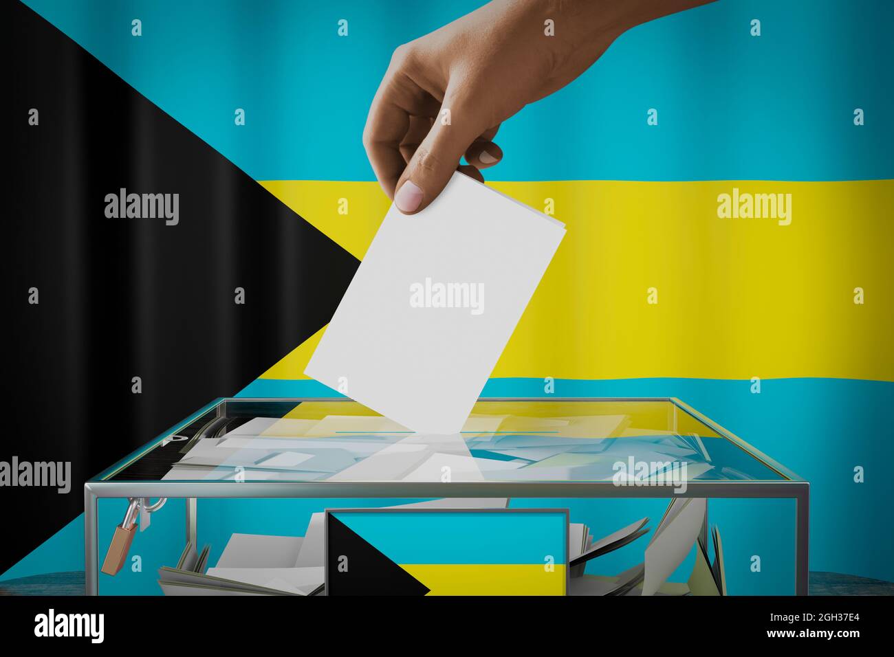 Bahamas flag, hand dropping ballot card into a box - voting, election ...