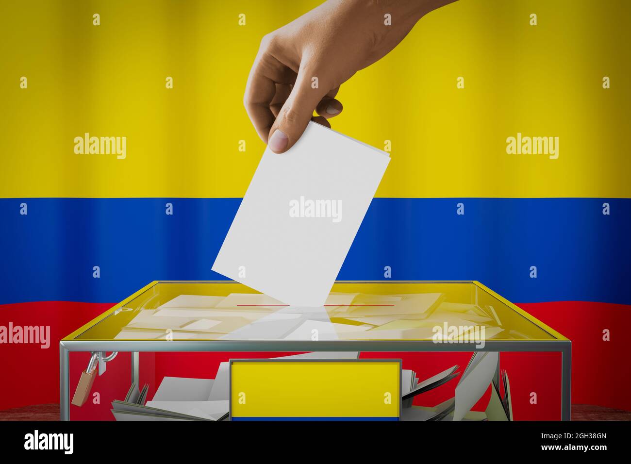 Colombia flag, hand dropping ballot card into a box - voting, election ...
