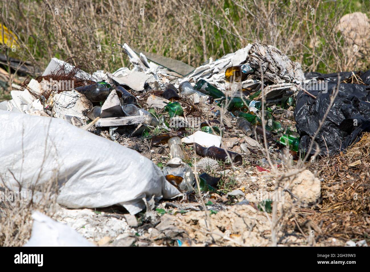 Littered with garbage fields and roadsides. Fireplaces from garbage and ...