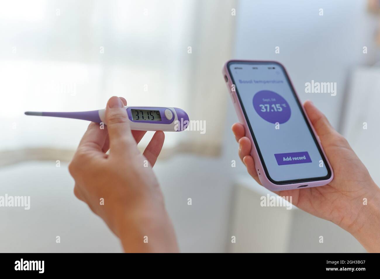 Taking body temperature hi-res stock photography and images - Alamy