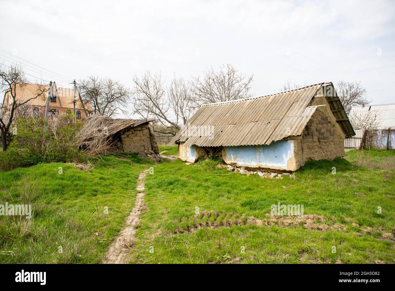 Ruined old house. Ruins of a house made of shell rock, straw and clay ...