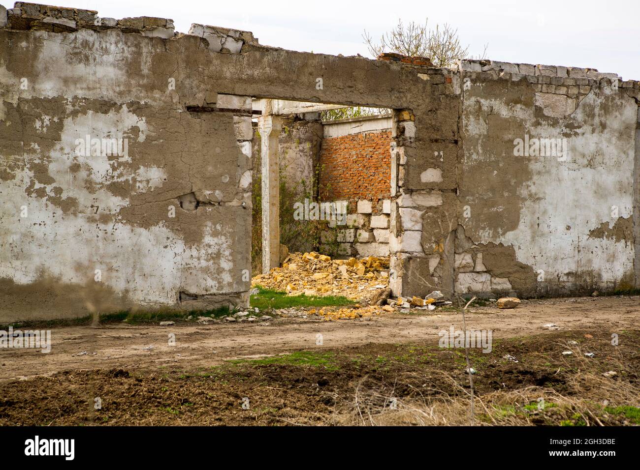 Ruined old house. Ruins of a house made of shell rock, straw and clay ...