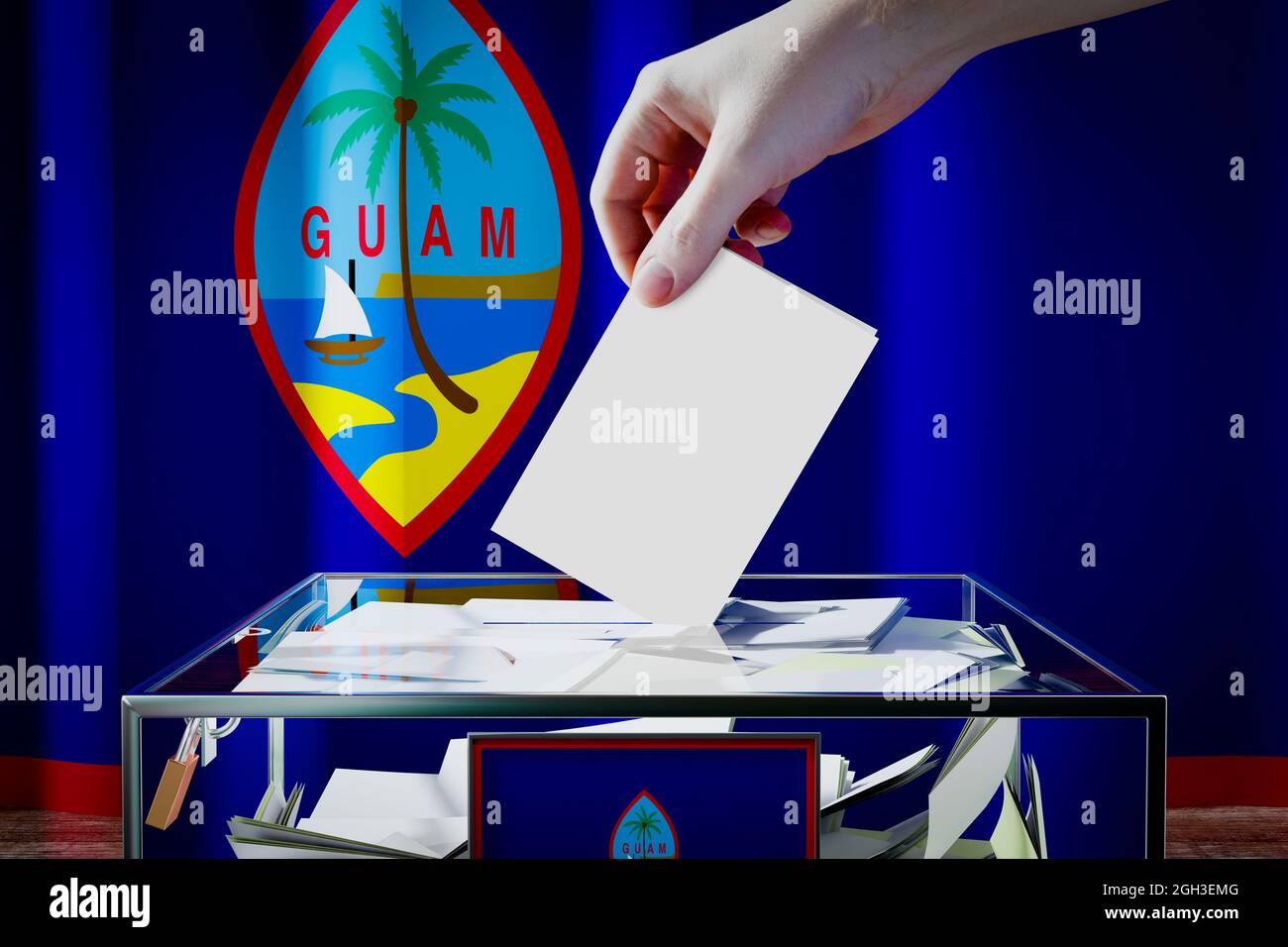 Guam flag, hand dropping ballot card into a box - voting, election ...