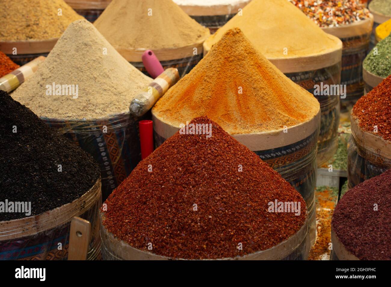Piles of different spices in a market Stock Photo - Alamy