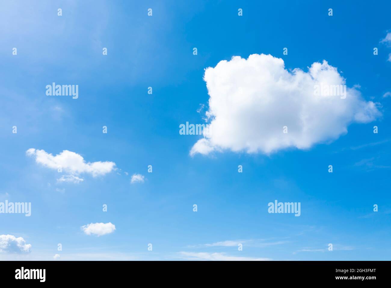 One fluffy white cloud in blue sky Stock Photo - Alamy