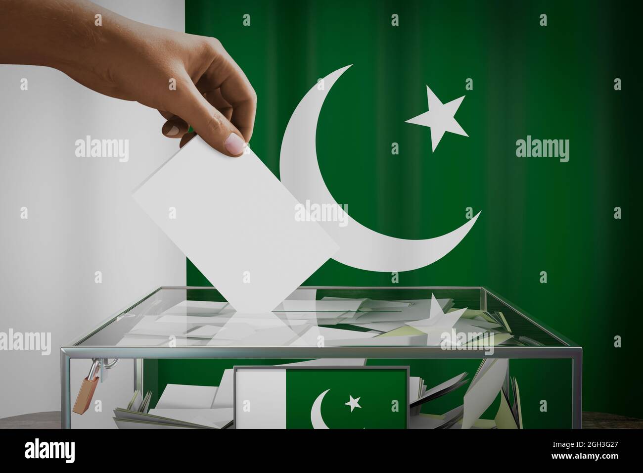 Pakistan flag, hand dropping ballot card into a box - voting, election ...
