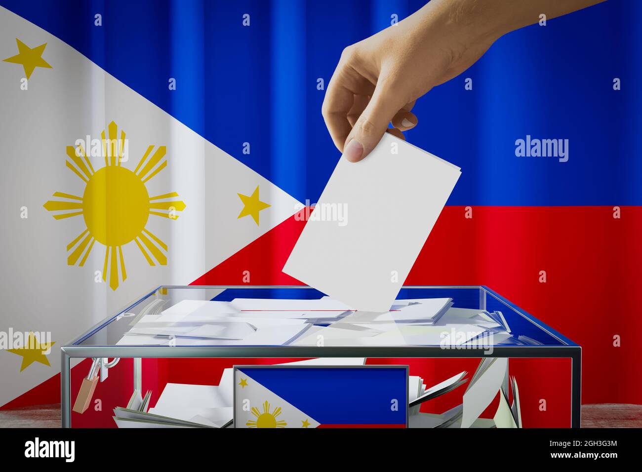 Philippines flag, hand dropping ballot card into a box - voting ...