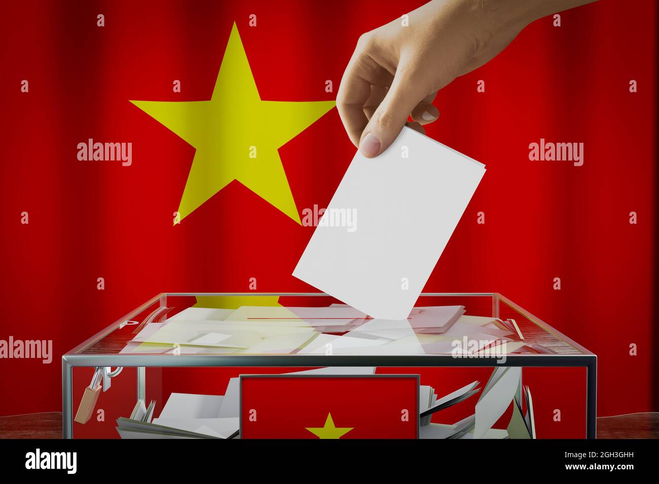 Vietnam flag, hand dropping ballot card into a box - voting, election ...