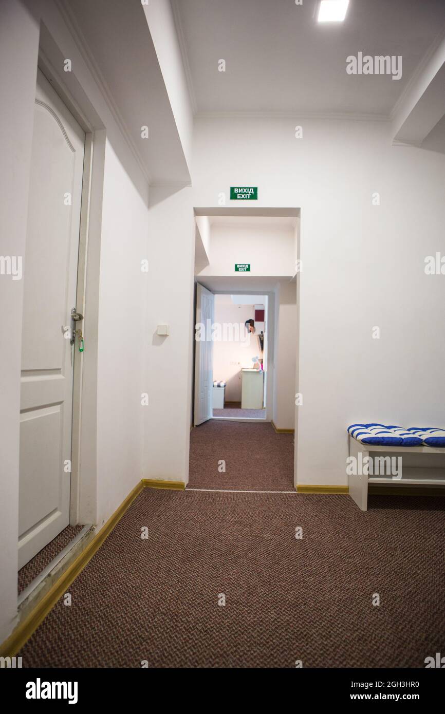Hall with many doors Stock Photo - Alamy