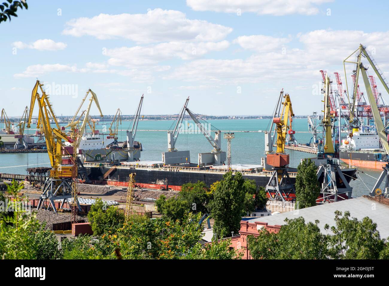 Port terminal of bulk cargo. Iron ore and grain terminal, elevator ...