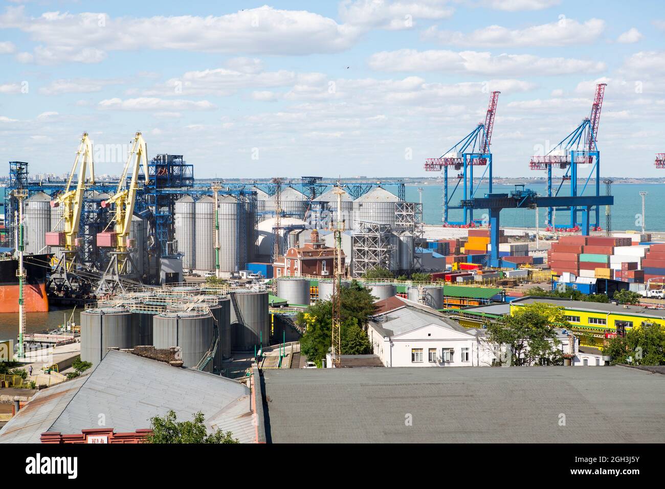 Port grain elevator. Industrial sea trading port bulk cargo zone grain ...