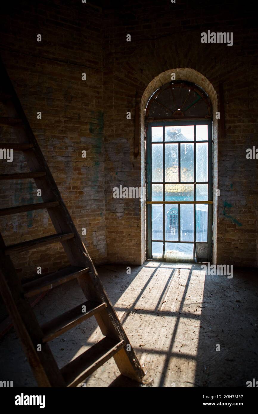 Old windows. Old windows in the wall of an abandoned house. Windows ...
