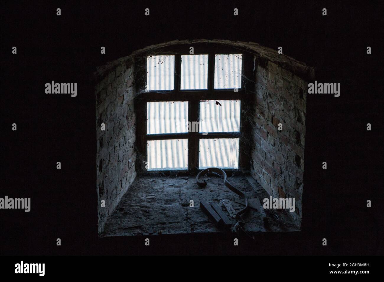 Old windows. Old windows in the wall of an abandoned house. Windows ...
