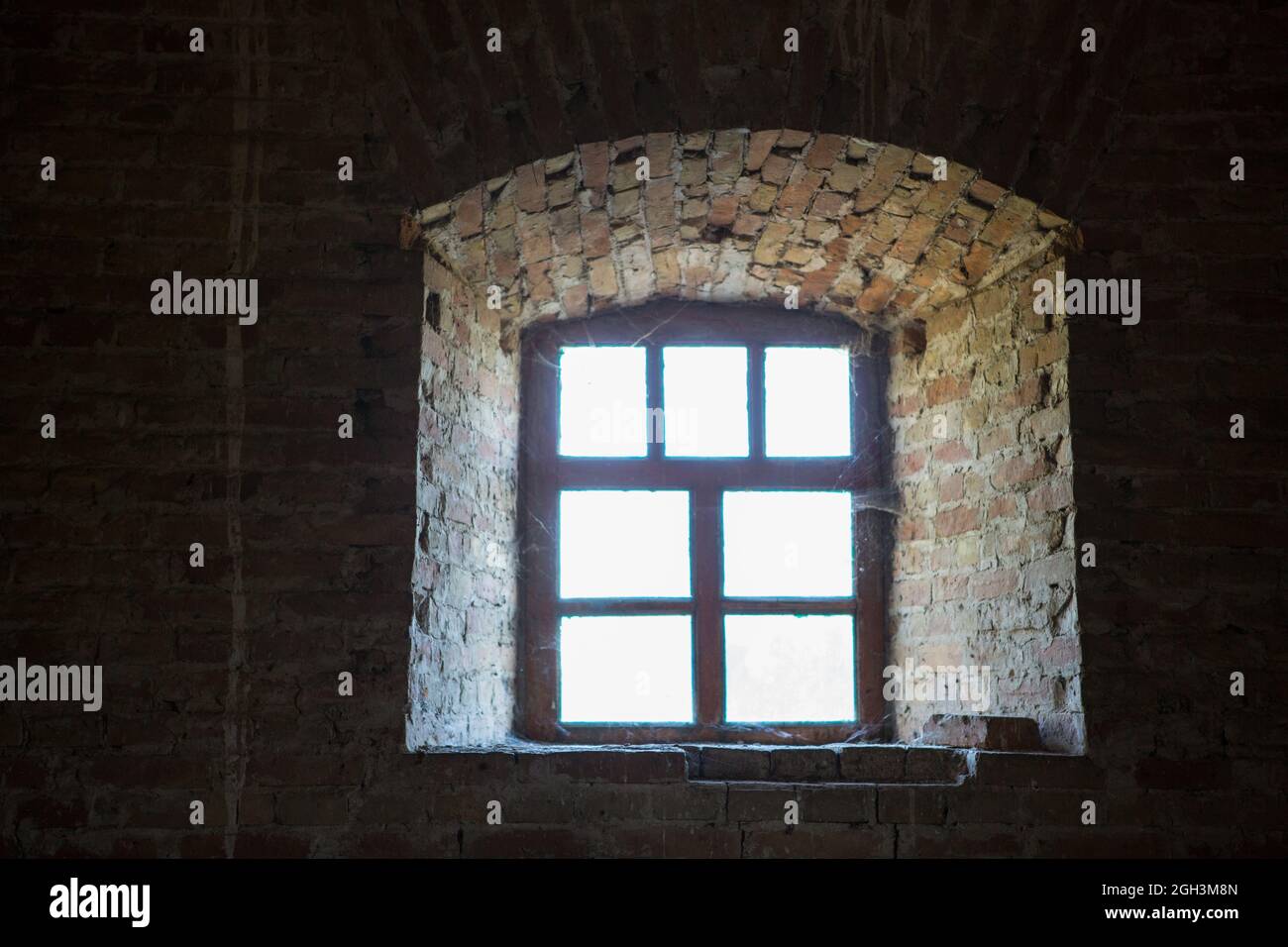Old windows. Old windows in the wall of an abandoned house. Windows ...