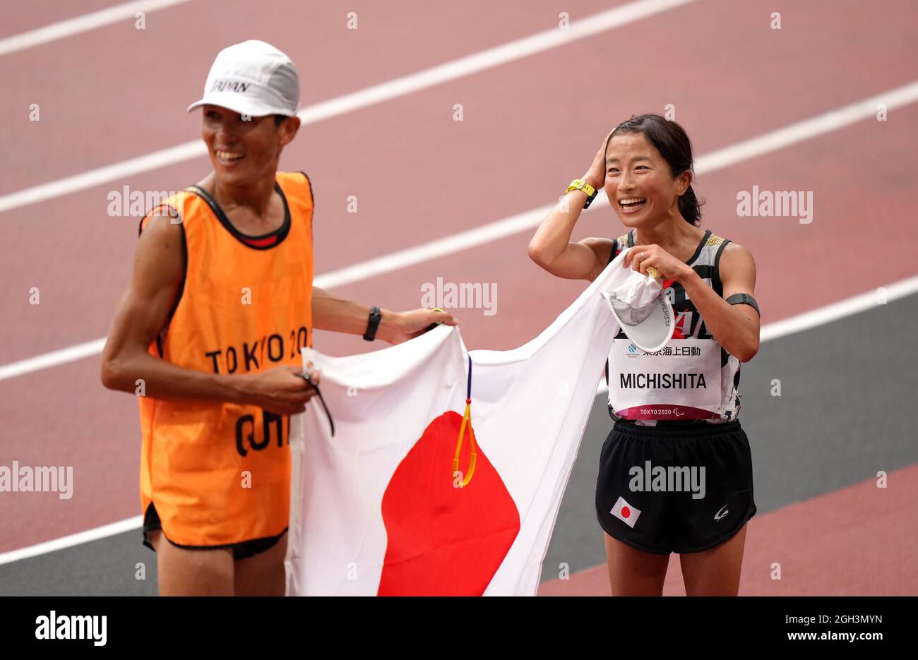 Misato Michishita of Japan celebrates after winning gold in the T11 ...