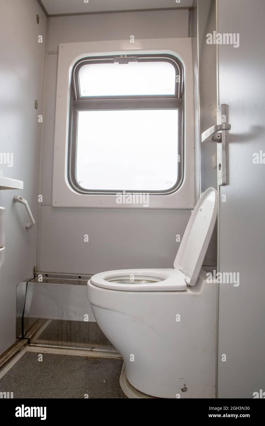 Classic toilet interior on the train. Toilet in the passenger train ...