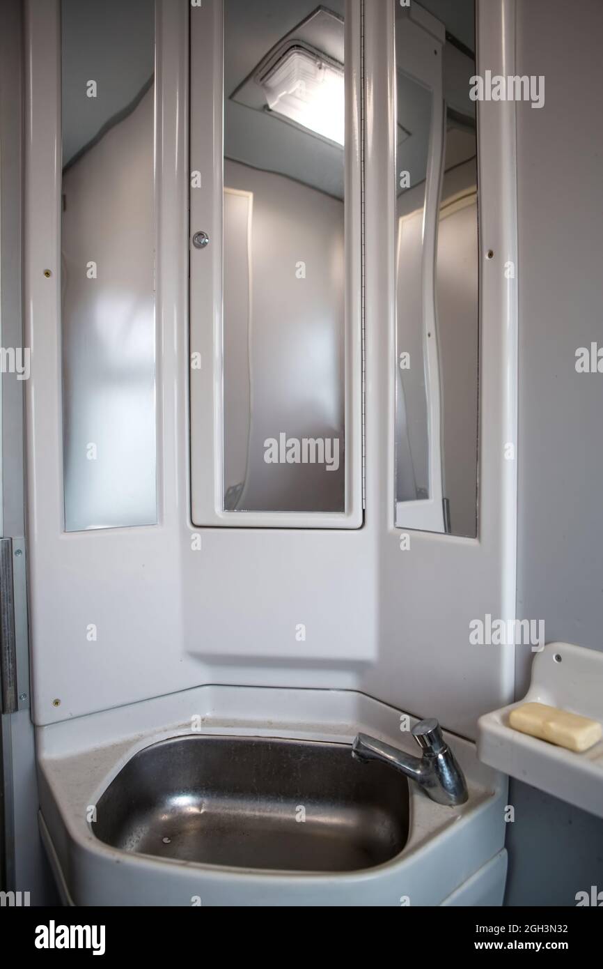 Classic toilet interior on the train. Toilet in the passenger train ...