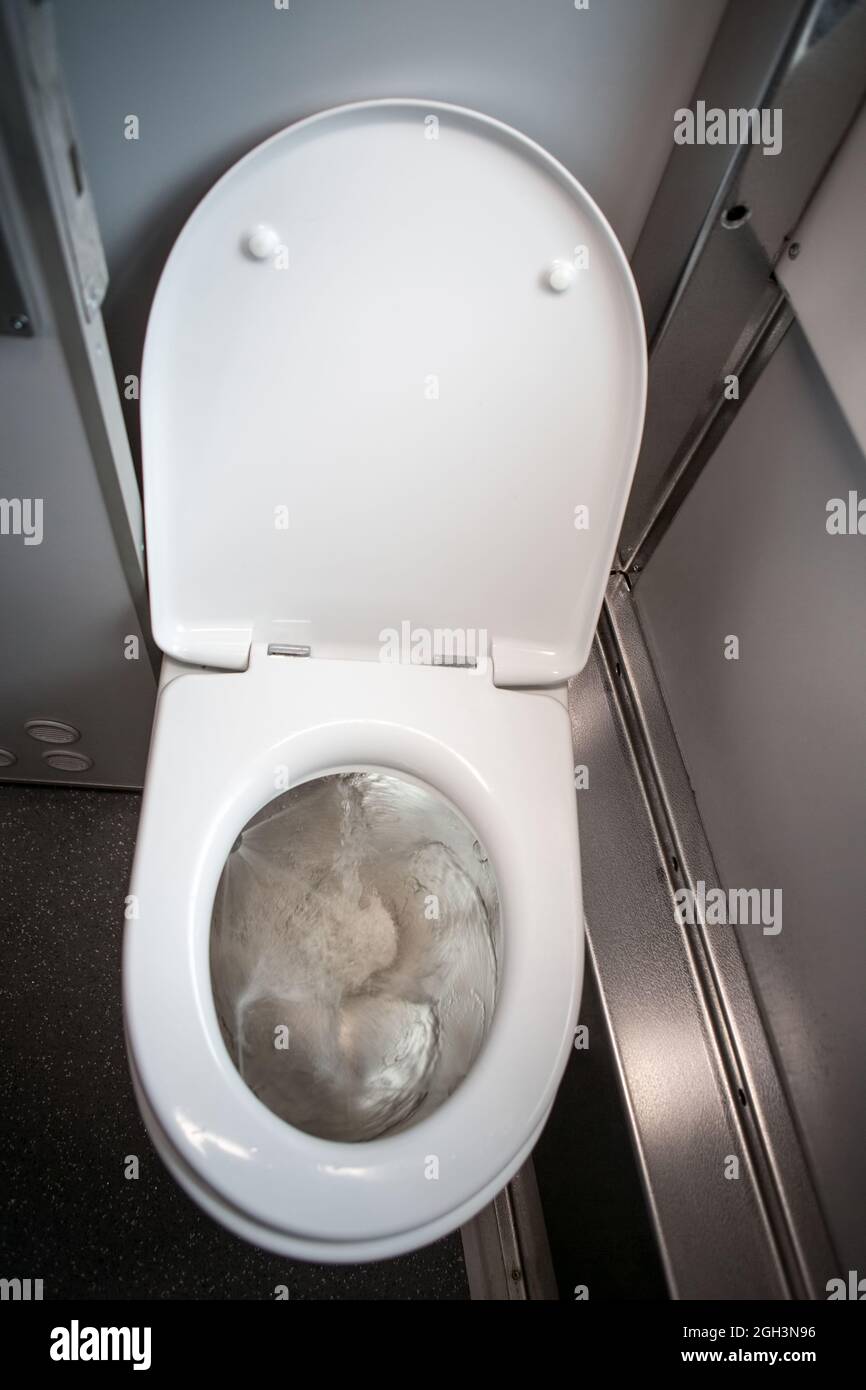 Classic toilet interior on the train. Toilet in the passenger train ...