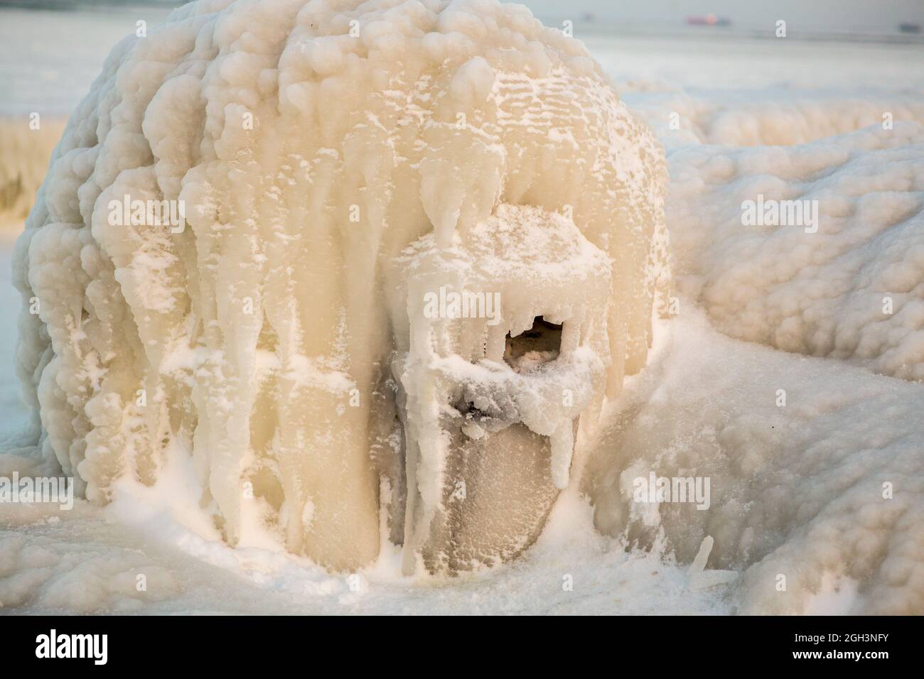 Icing. Winter natural disaster icing sea promenade after winter storm ...
