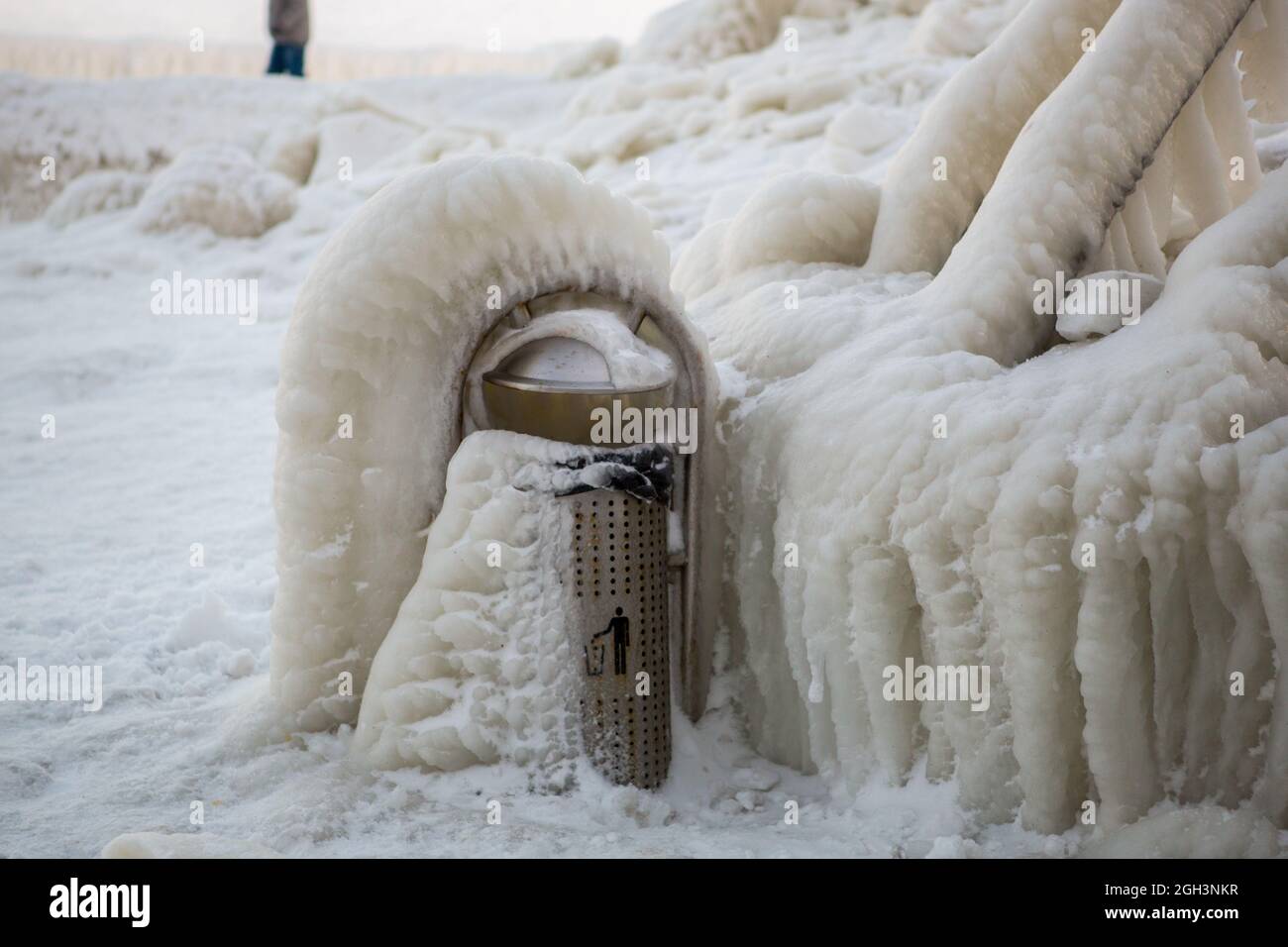 Icing. Winter natural disaster icing sea promenade after winter storm ...