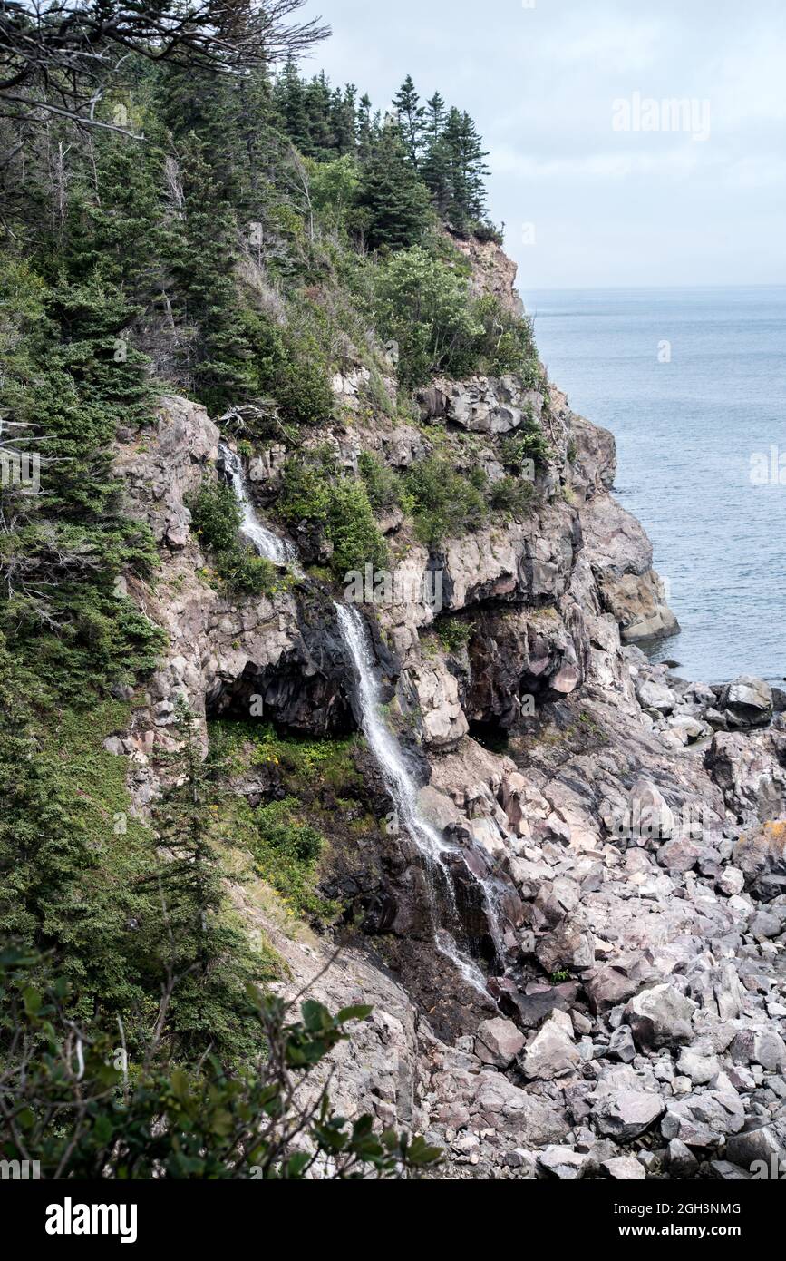 Water Falls of the Cliffs of Seven Days Work on Grand Manan Stock Photo - Alamy