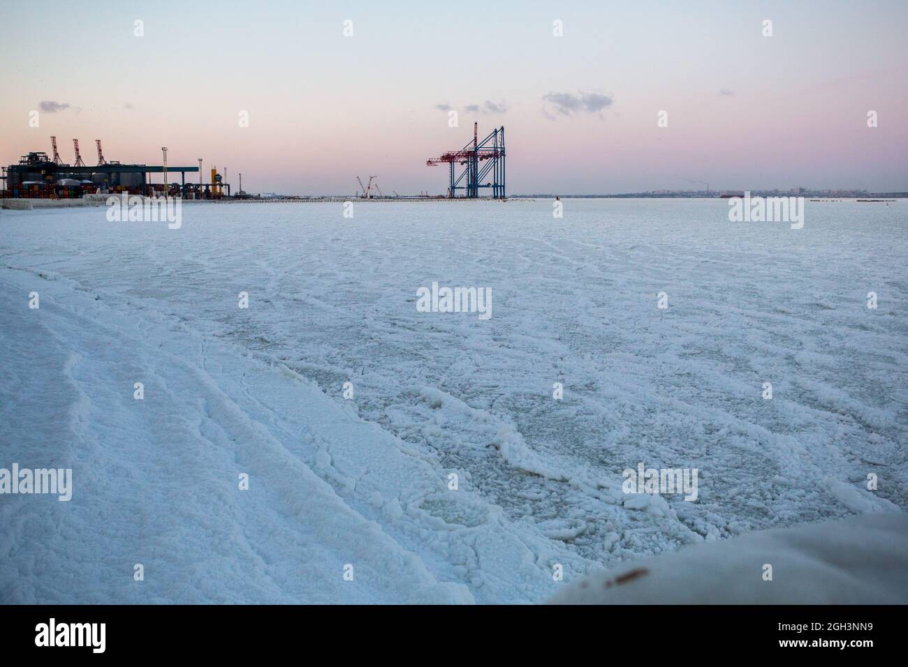 Icing. Winter natural disaster icing sea promenade after winter storm ...