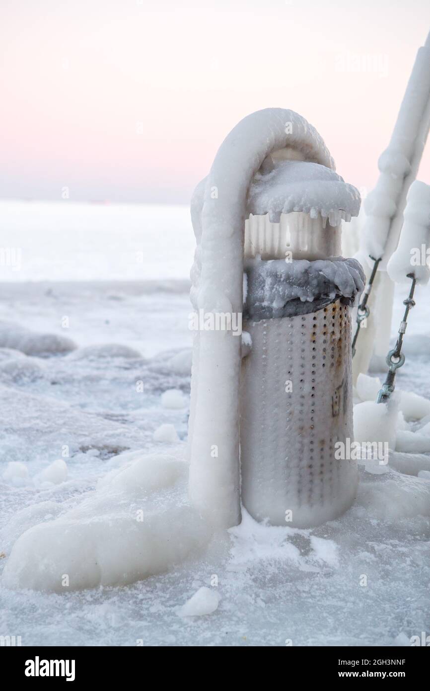 Icing. Winter natural disaster icing sea promenade after winter storm ...