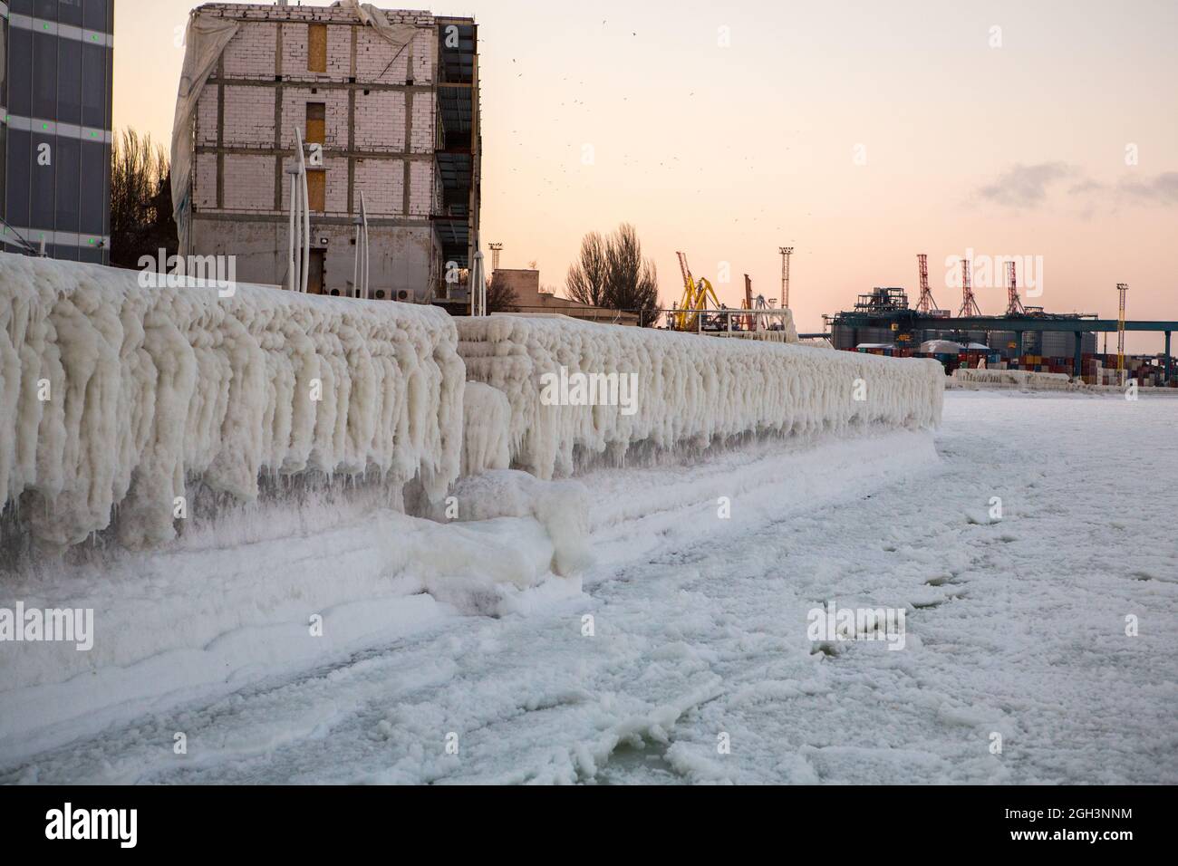Icing. Winter natural disaster icing sea promenade after winter storm ...