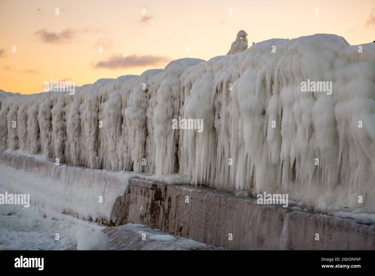 Icing. Winter natural disaster icing sea promenade after winter storm ...