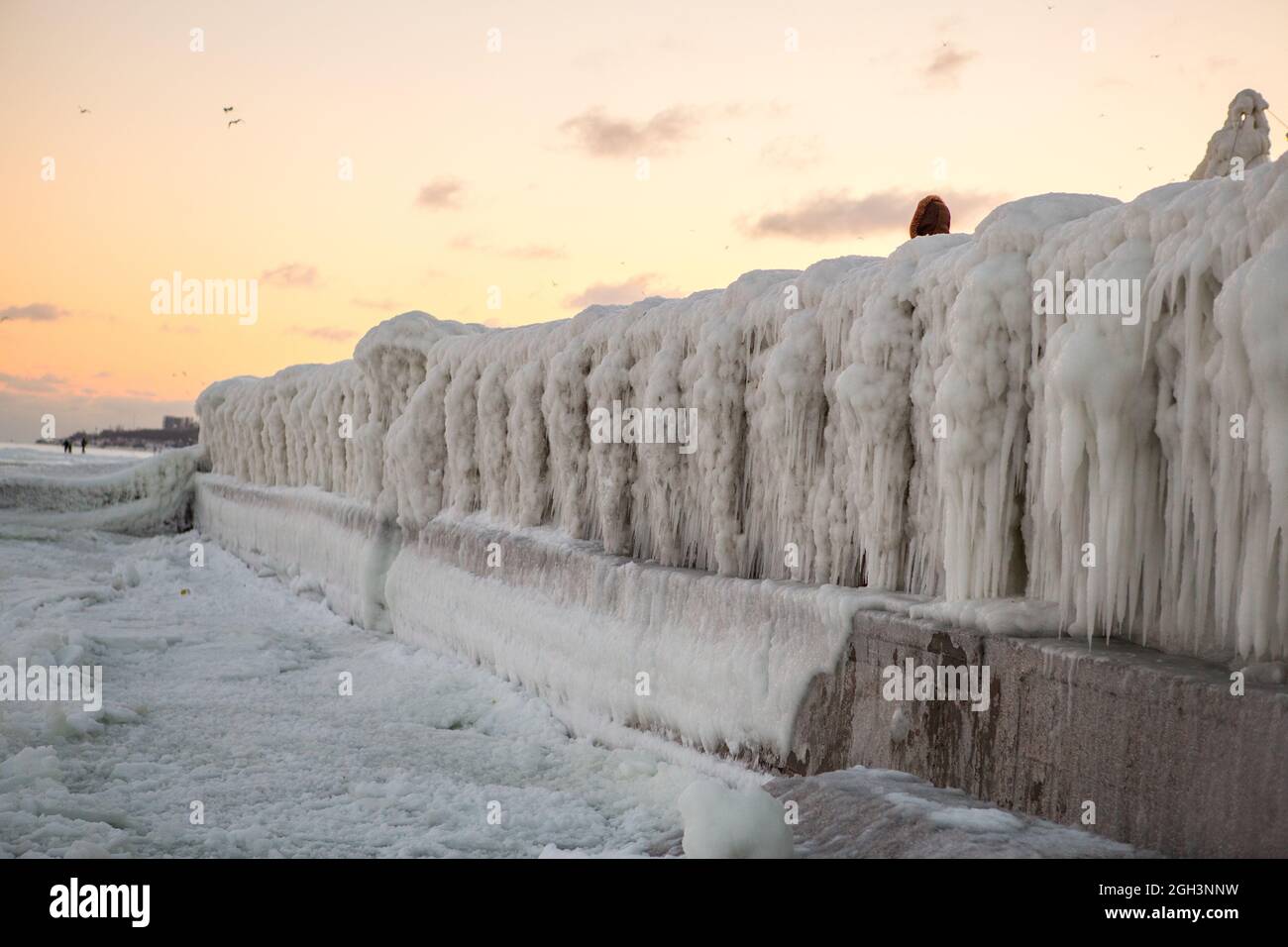 Icing. Winter natural disaster icing sea promenade after winter storm ...