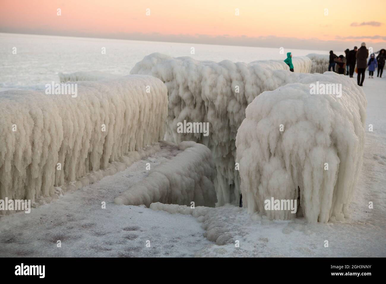 Icing. Winter natural disaster icing sea promenade after winter storm ...