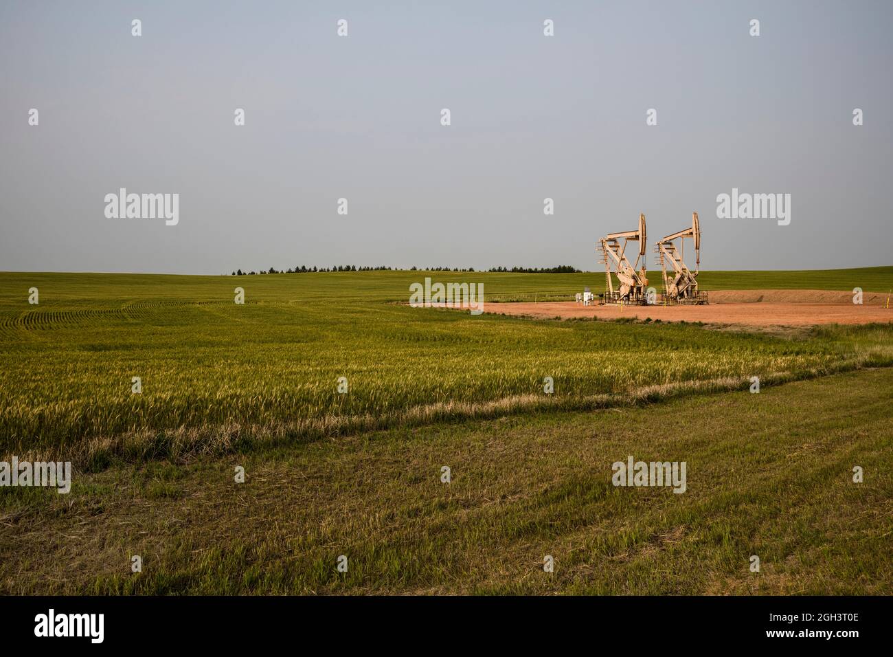 Oil and Farming Side by Side Stock Photo - Alamy