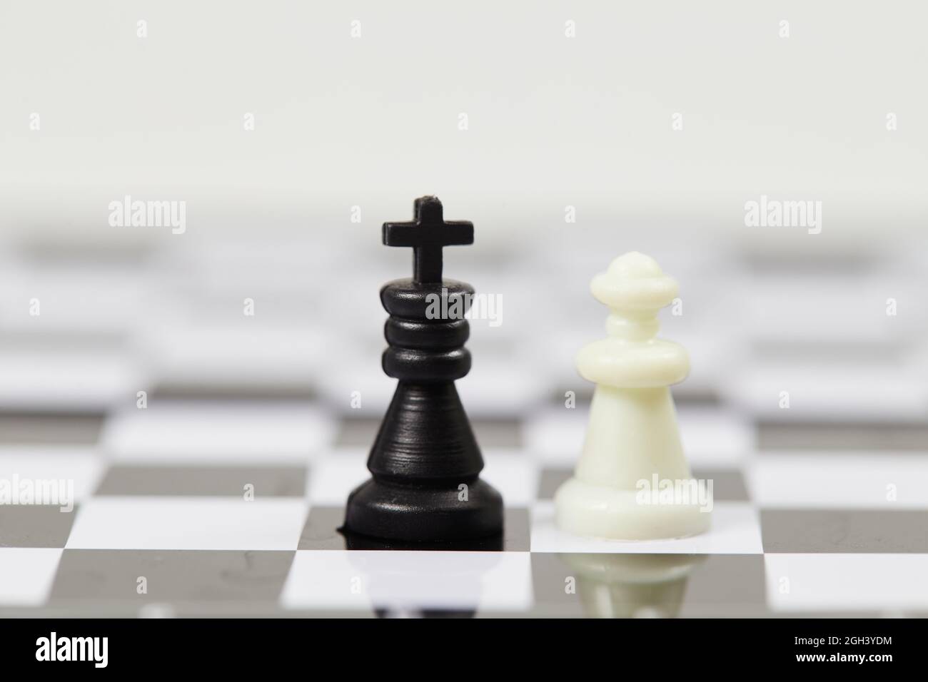 Chess pieces on a chessboard close up Stock Photo - Alamy