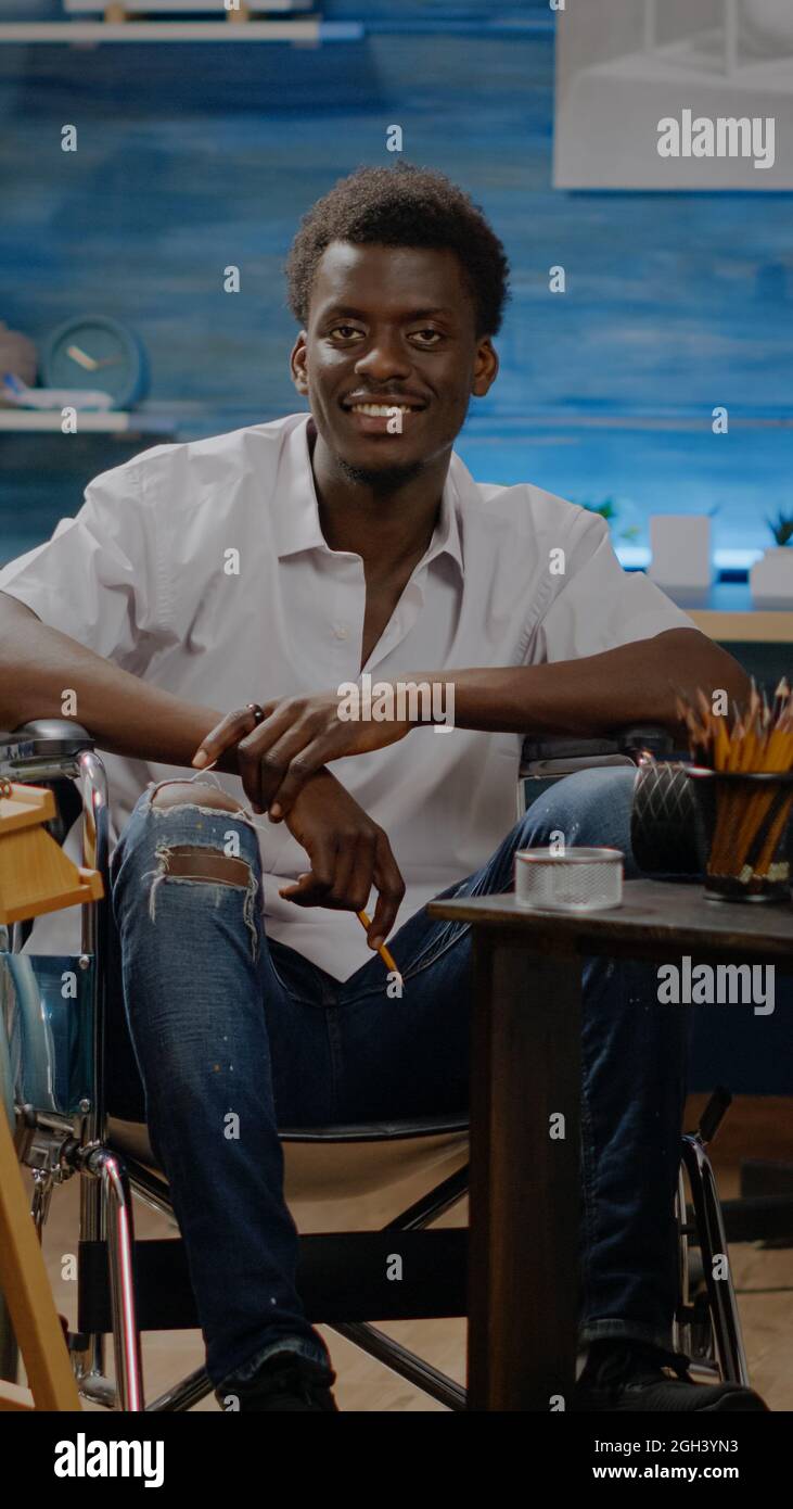 Portrait of disabled african american artist at creativity studio ...