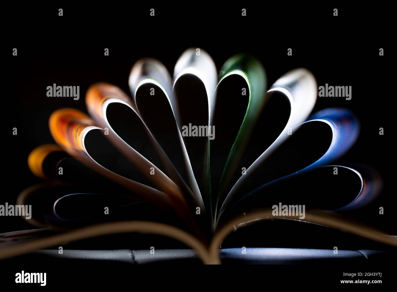 Magazine with light in the house Stock Photo - Alamy