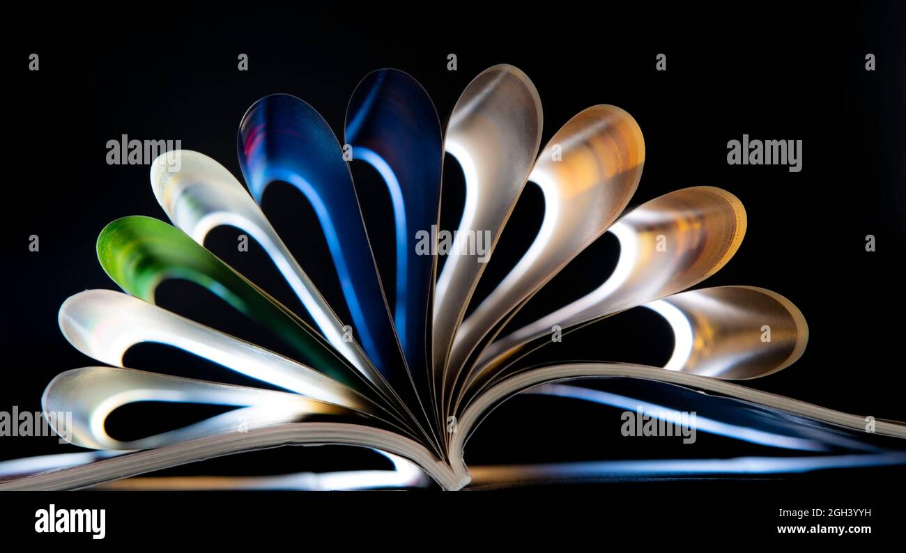 Magazine with light in the house Stock Photo - Alamy