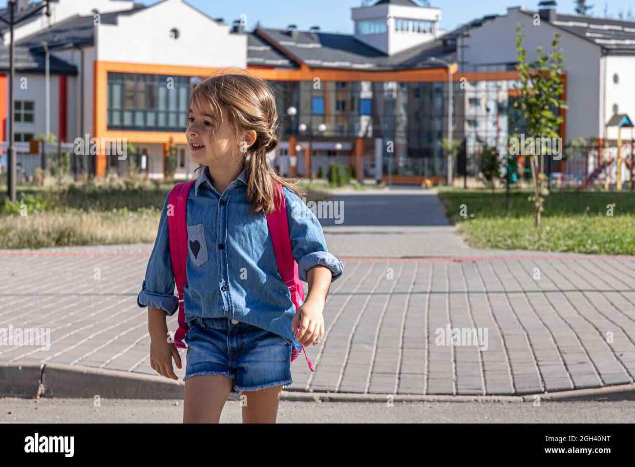 A primary school student goes home after school, the first day of ...