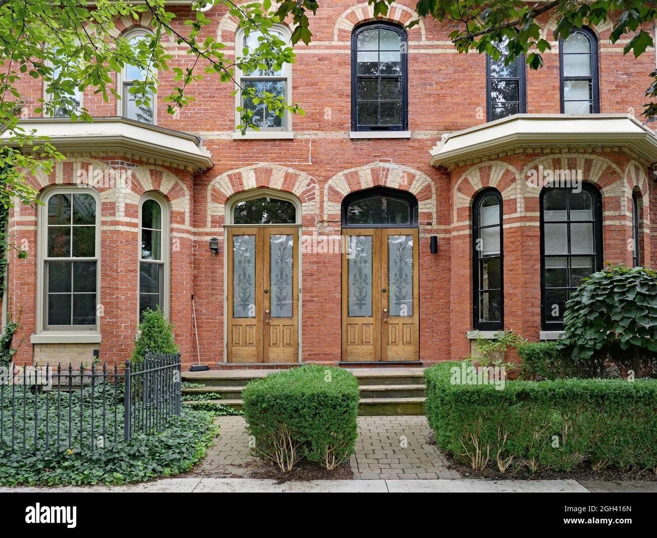 Gentrified Victorian row houses with multicolored patterned brick Stock ...