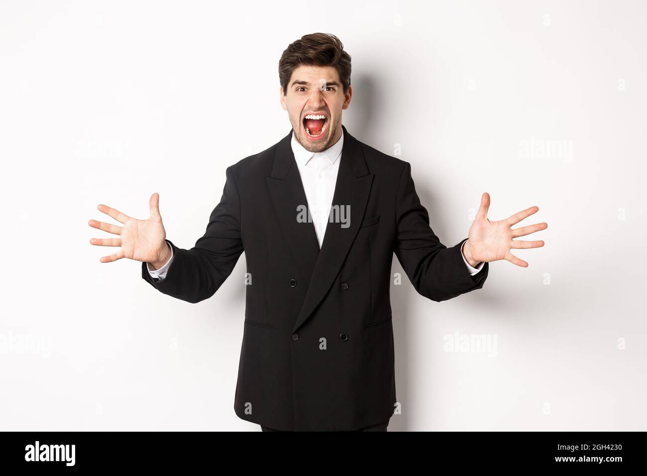 Portrait of pissed-off and frustrated businessman in suit, shouting ...
