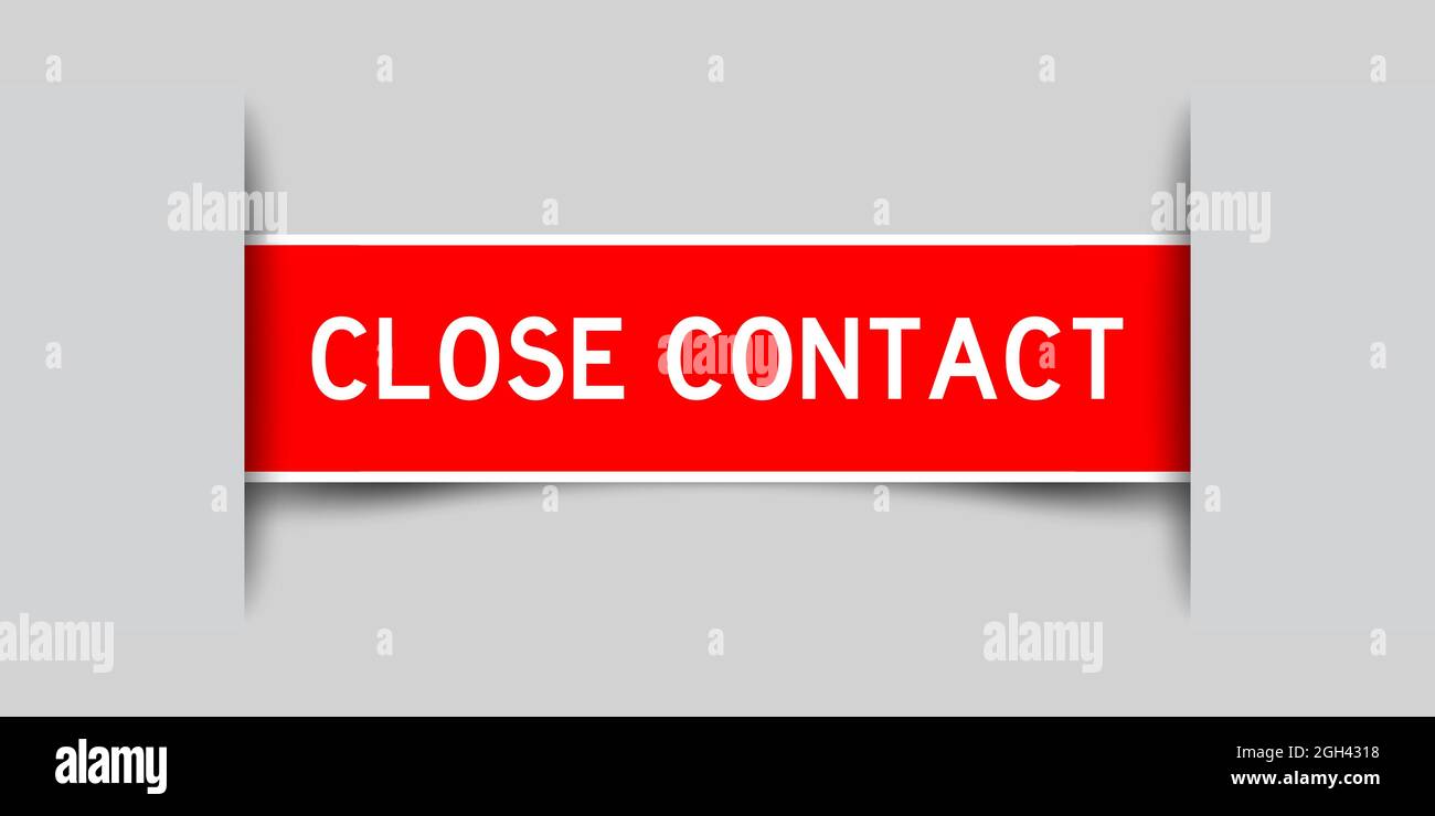Label sticker red color in word close contact that inserted in gray ...