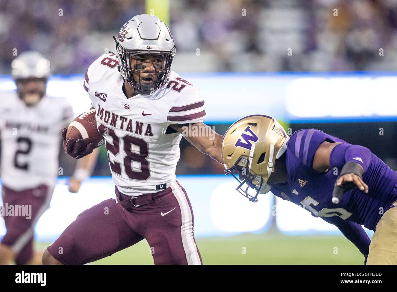 Montana Grizzlies running back Isiah Childs (28) runs with the ball ...