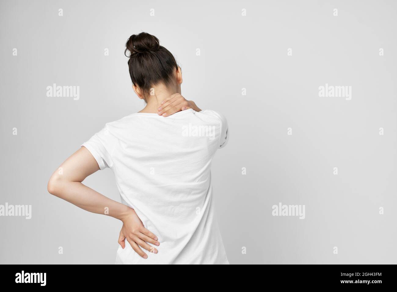 woman painful syndrome discomfort isolated background Stock Photo - Alamy