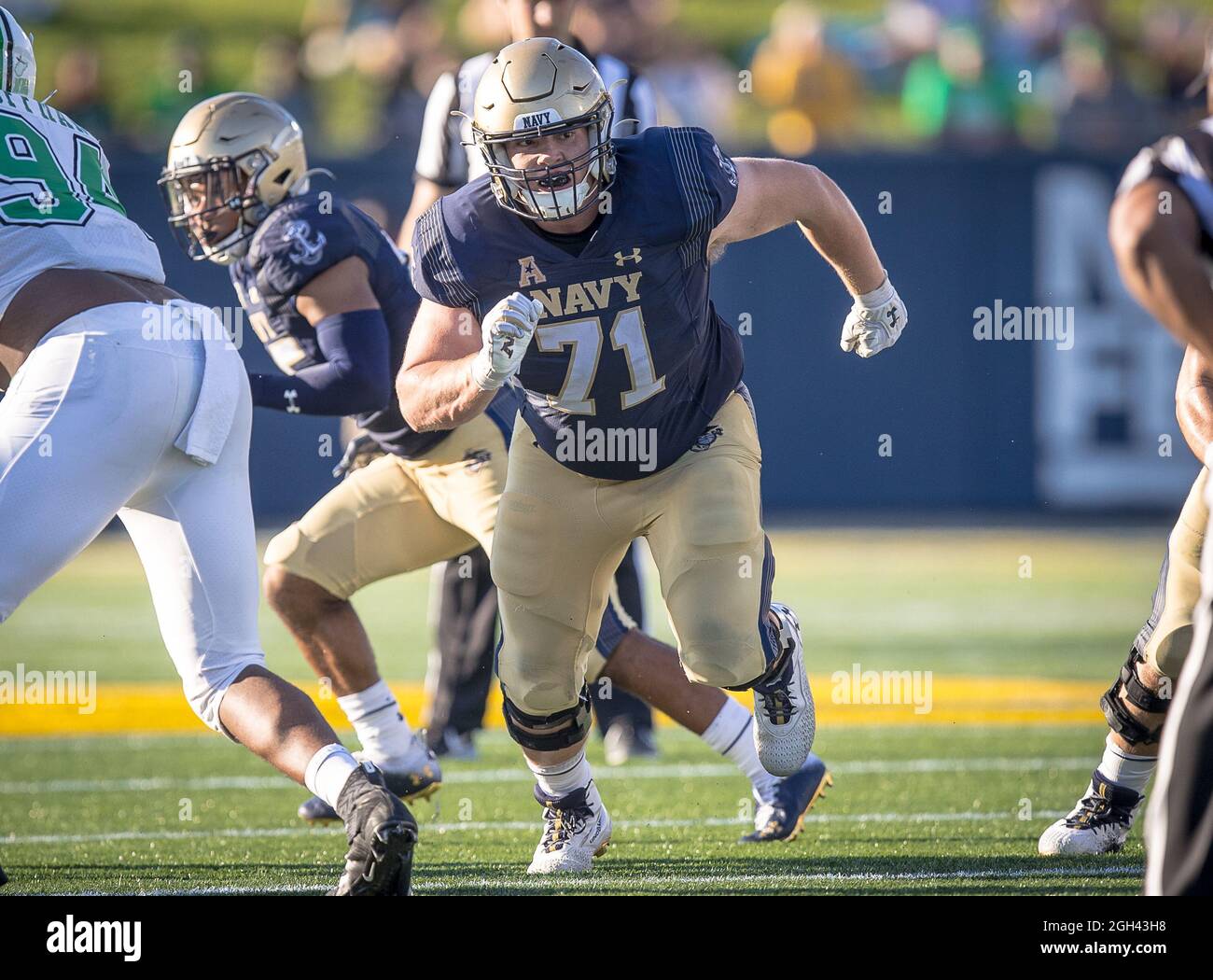 September 4, 2021: Navy Midshipmen guard Joshua Pena (71) fires off the ...