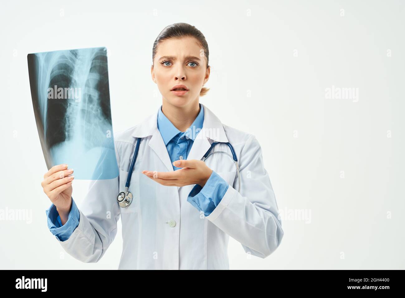 emotional radiologist x-ray hospital light background Stock Photo - Alamy
